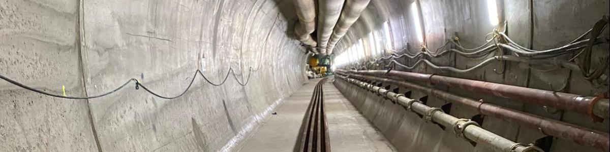 BREAKTHROUGH OF TEMPORARY WORKS TUNNEL FOR RAIL DELIVERIES ON BANK ...
